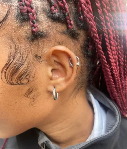 Cartilage (Helix) Piercing in Nairobi, Kenya - Rebel Inks Tattoo